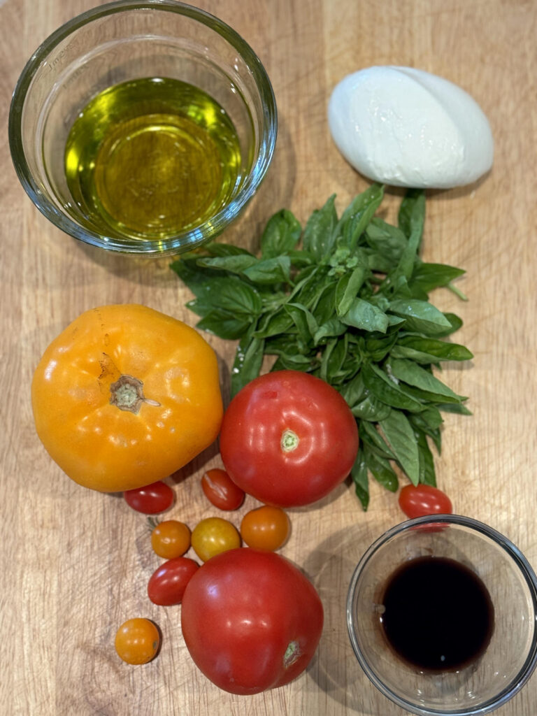 Burrata Caprese with Basil Oil - Delicious by Design